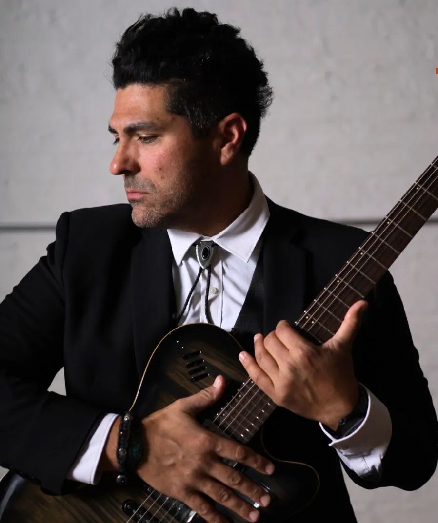 Guitarist Christian Larumbe Performs - Pure Ludington